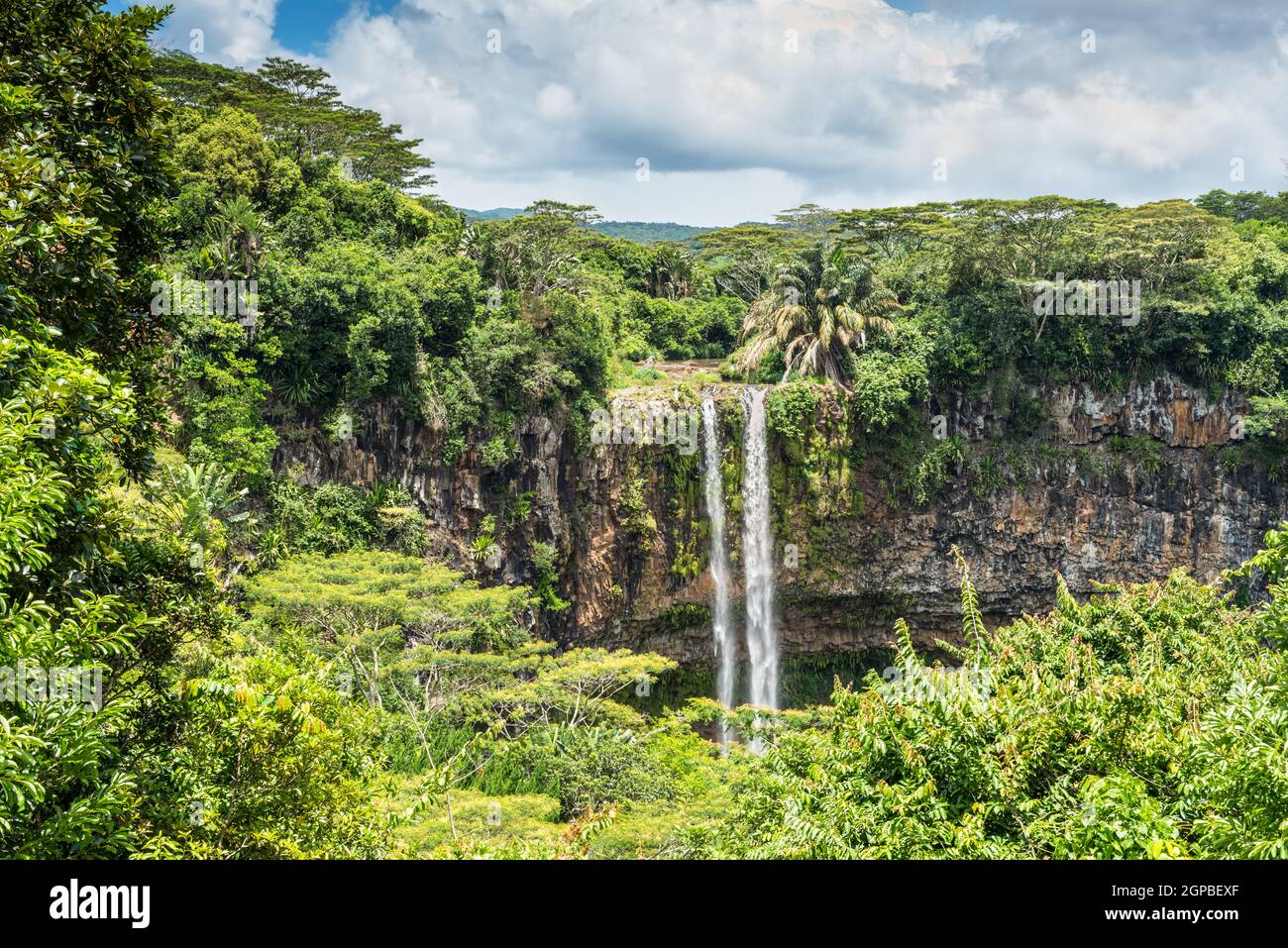Scenic Chamarel Waterfalls in jungle of Mauritius island Stock Photo ...