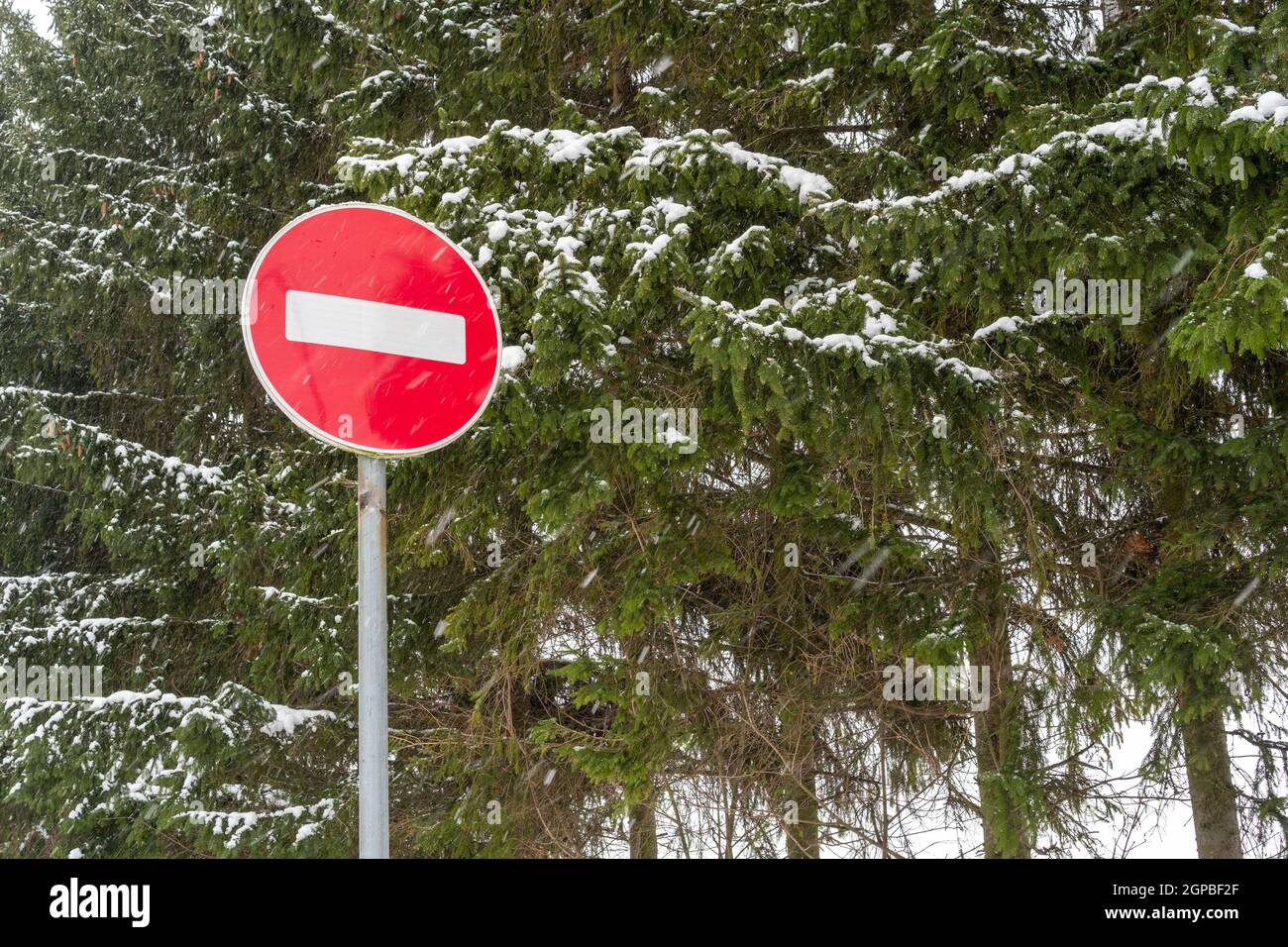 Stop street sign in winter season. Hazard drive carefully in the ...