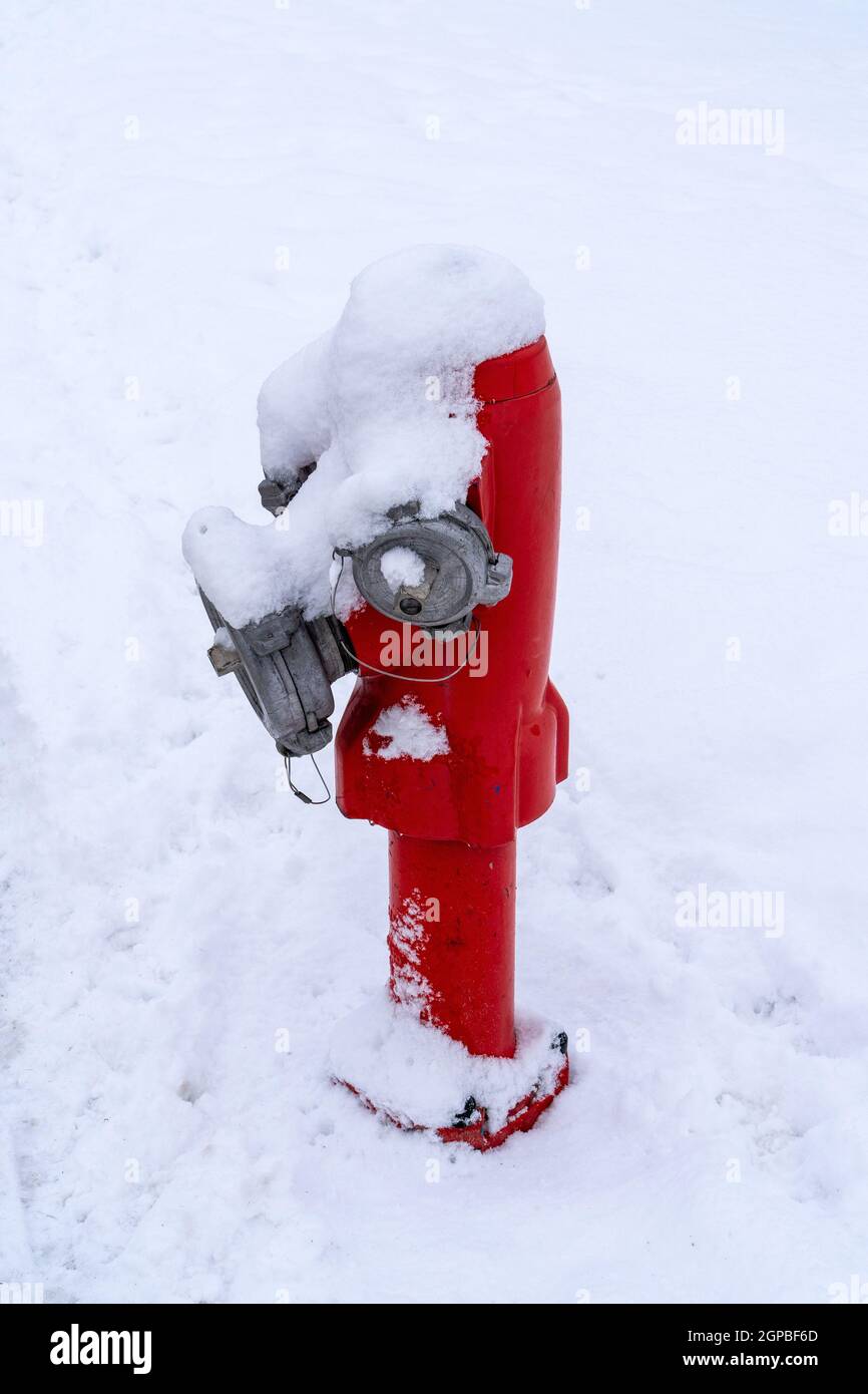Red Fire Hydrant in the Snow Stock Photo - Alamy