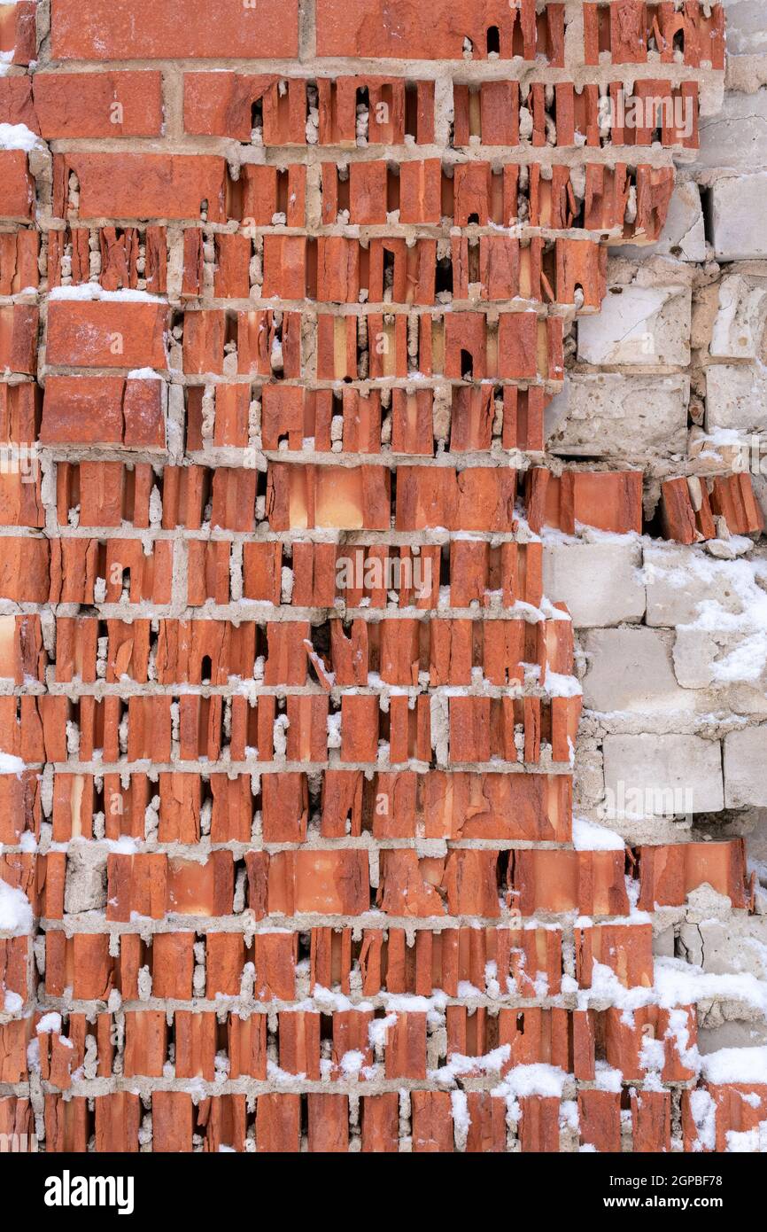 Outdoor texture - demaged red brick wall background Stock Photo - Alamy