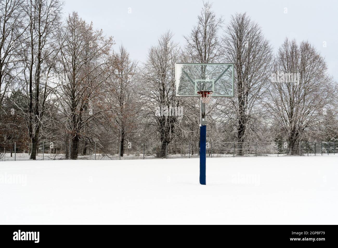 Basketball court in the winter under the snow Stock Photo - Alamy