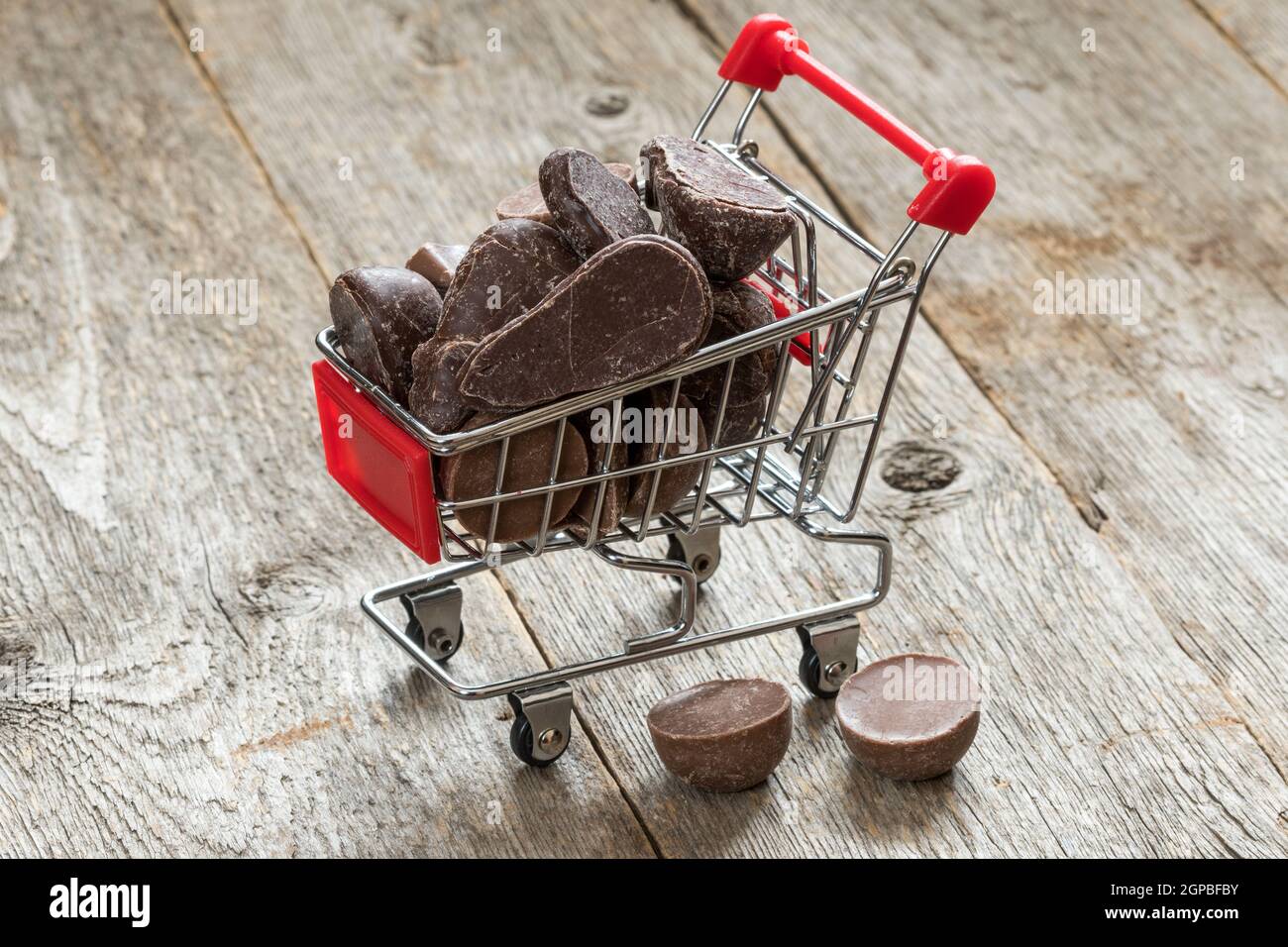 Shopping cart trolley with a chocolate candies Stock Photo - Alamy