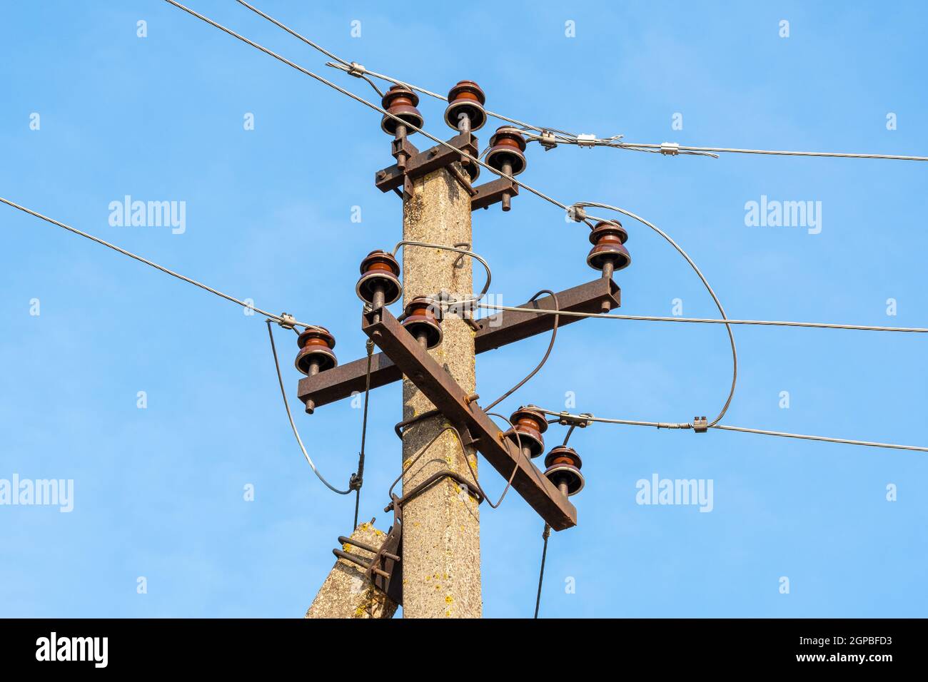 Insulators power lines against the sky background Stock Photo - Alamy