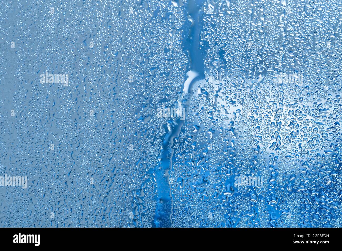 Background of the condensate flowing water on the window glass Stock ...