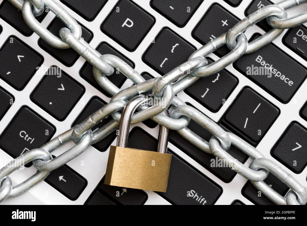 Cyber safety concept, locked chain on laptop computer keyboard Stock ...