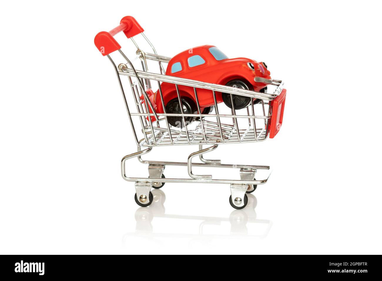 Car shopping concept. New car in a shopping basket isolated on white ...