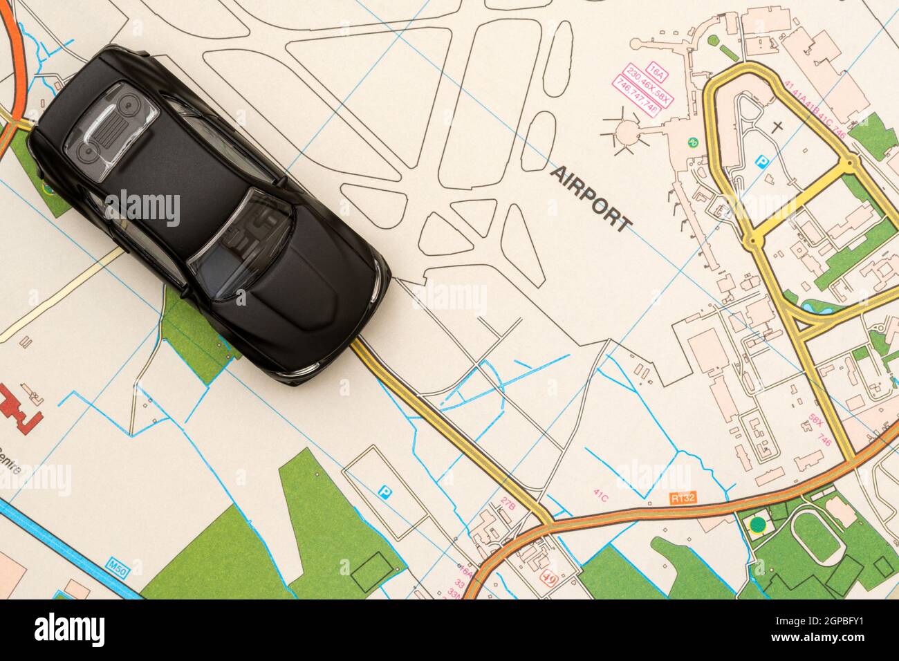 Travel concept - small toy car on the map travelling to airport Stock ...
