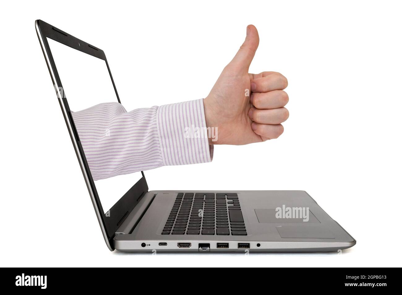 Businessman thumbs up through a laptop, isolated on white background ...