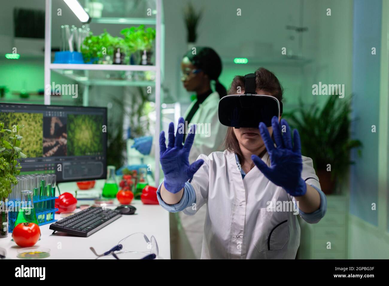 Woman biologist in virtual reality hi-res stock photography and images ...
