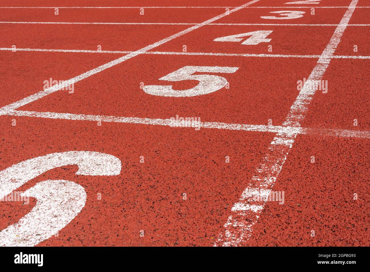 Numbers on the start of a running track Stock Photo - Alamy