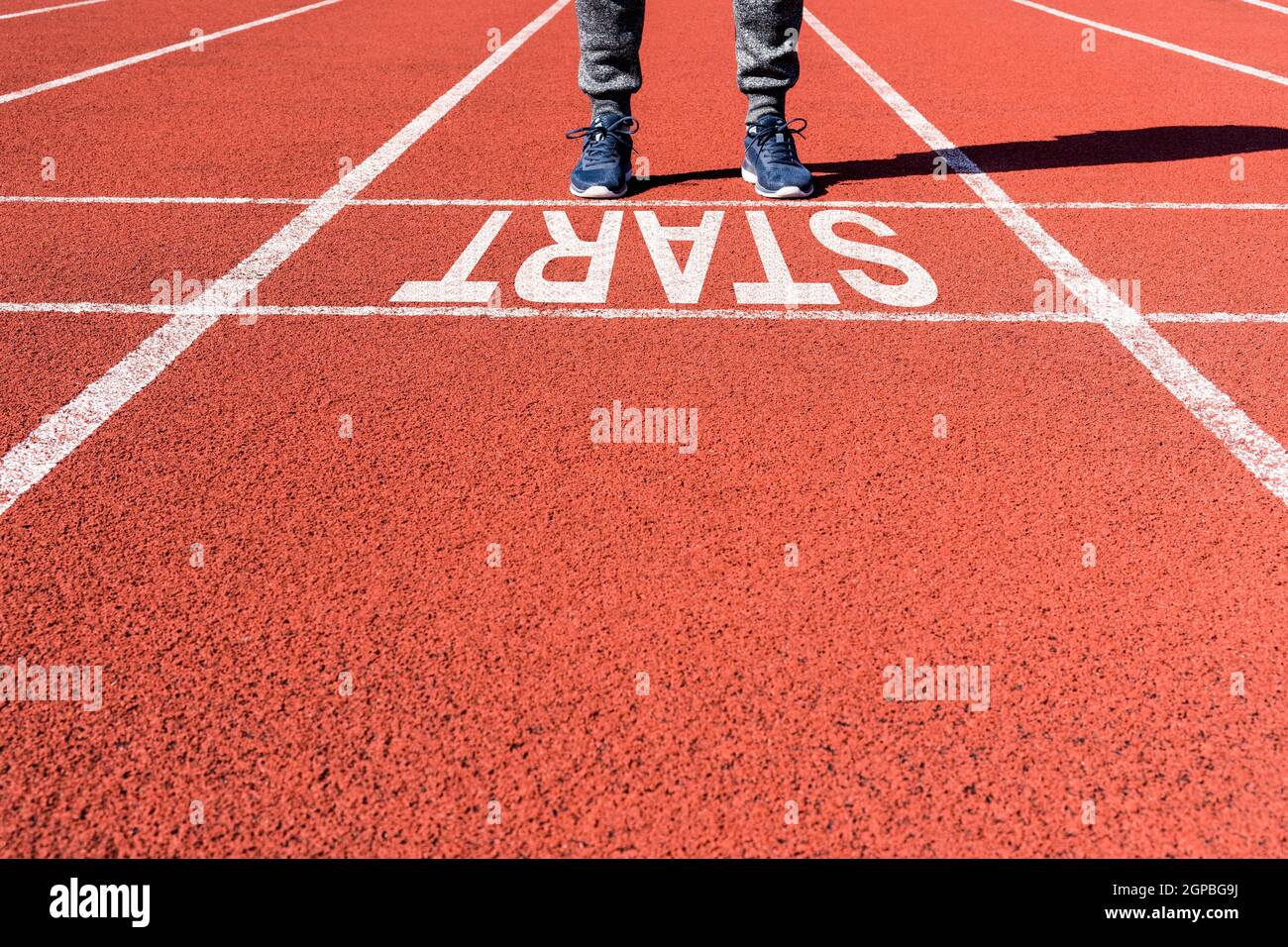 Runner feet on the starting line. New day, sport and healthy life ...