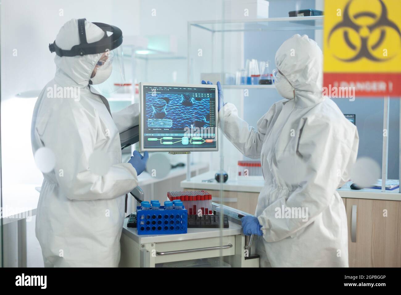 Medical teamwork with protective equipment against covid19 analyzing ...