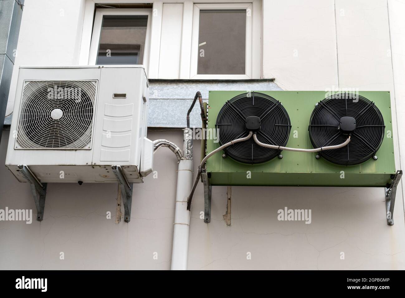 Air conditioning system installed outside on a building wall Stock ...