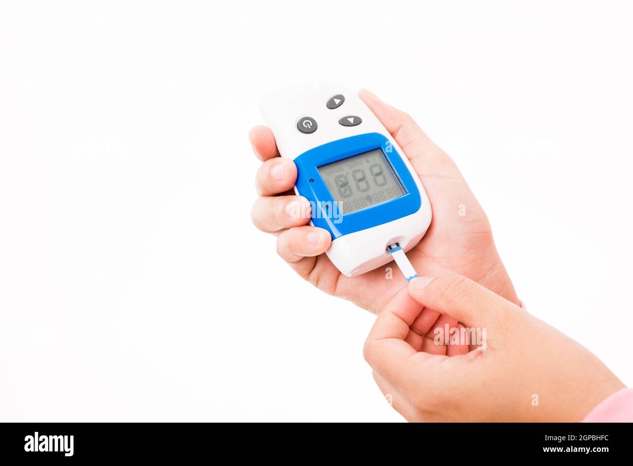 Closeup hands woman measuring glucose test level checking on a finger ...