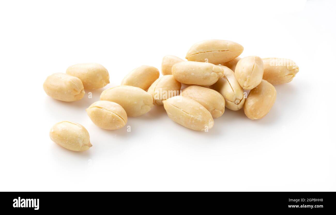 A lot of peanuts on a white background Stock Photo - Alamy