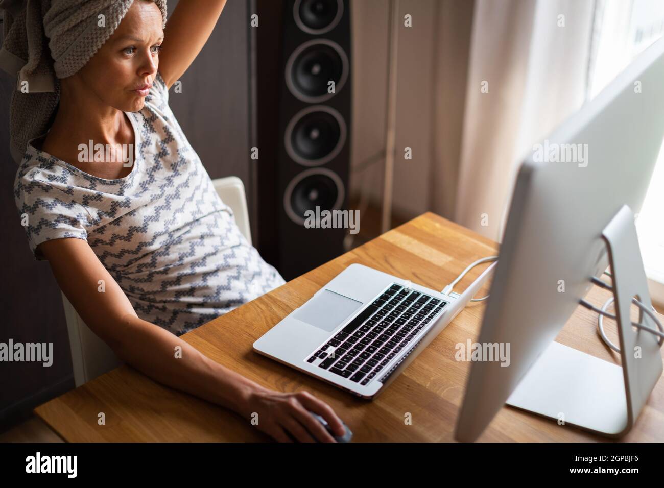 Home office/Remote work series - Pretty, young woman working at her ...