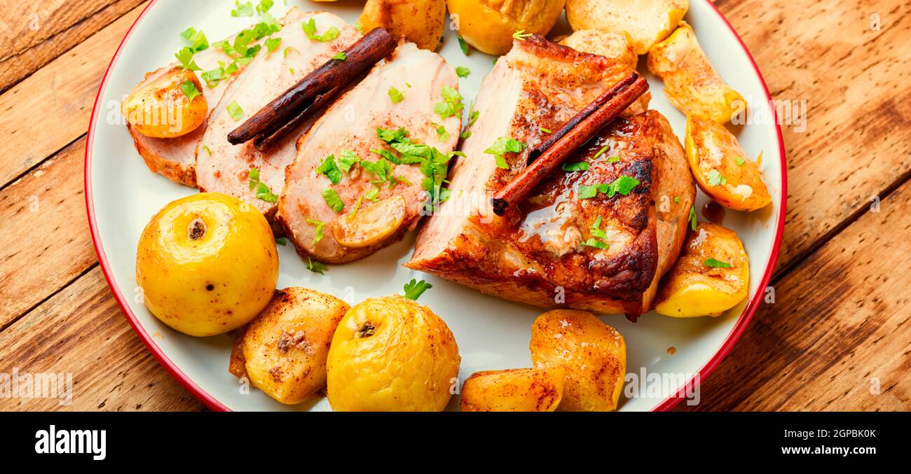 Baked meat with apples.Fried pork loin stuffed with apple Stock Photo ...