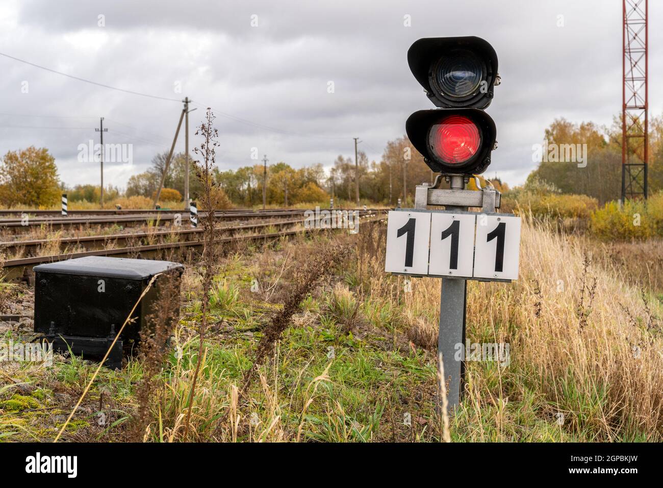 Traffic light shows red signal on railway Stock Photo - Alamy