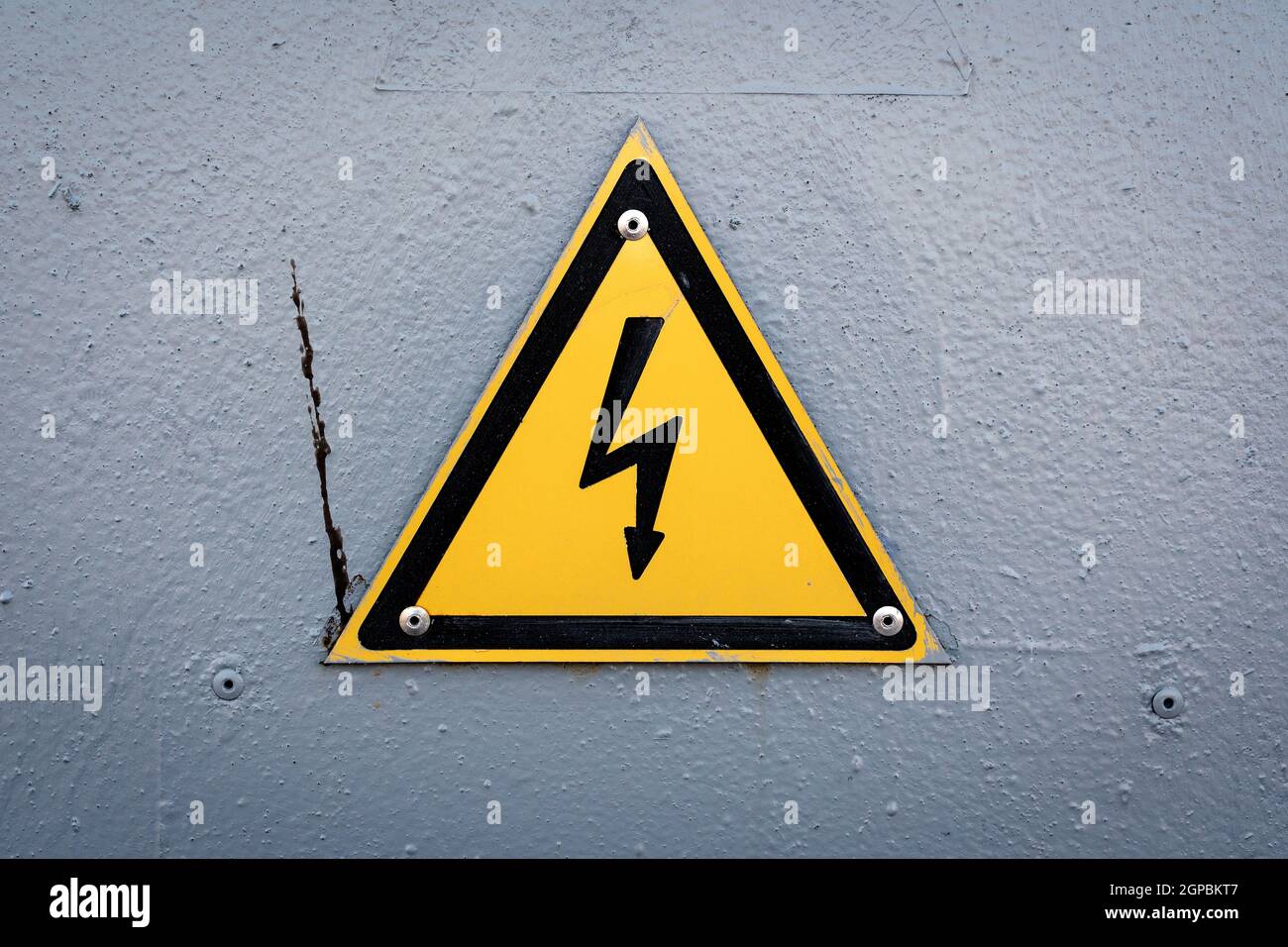 High voltage warning sign on high-voltage substation Stock Photo - Alamy