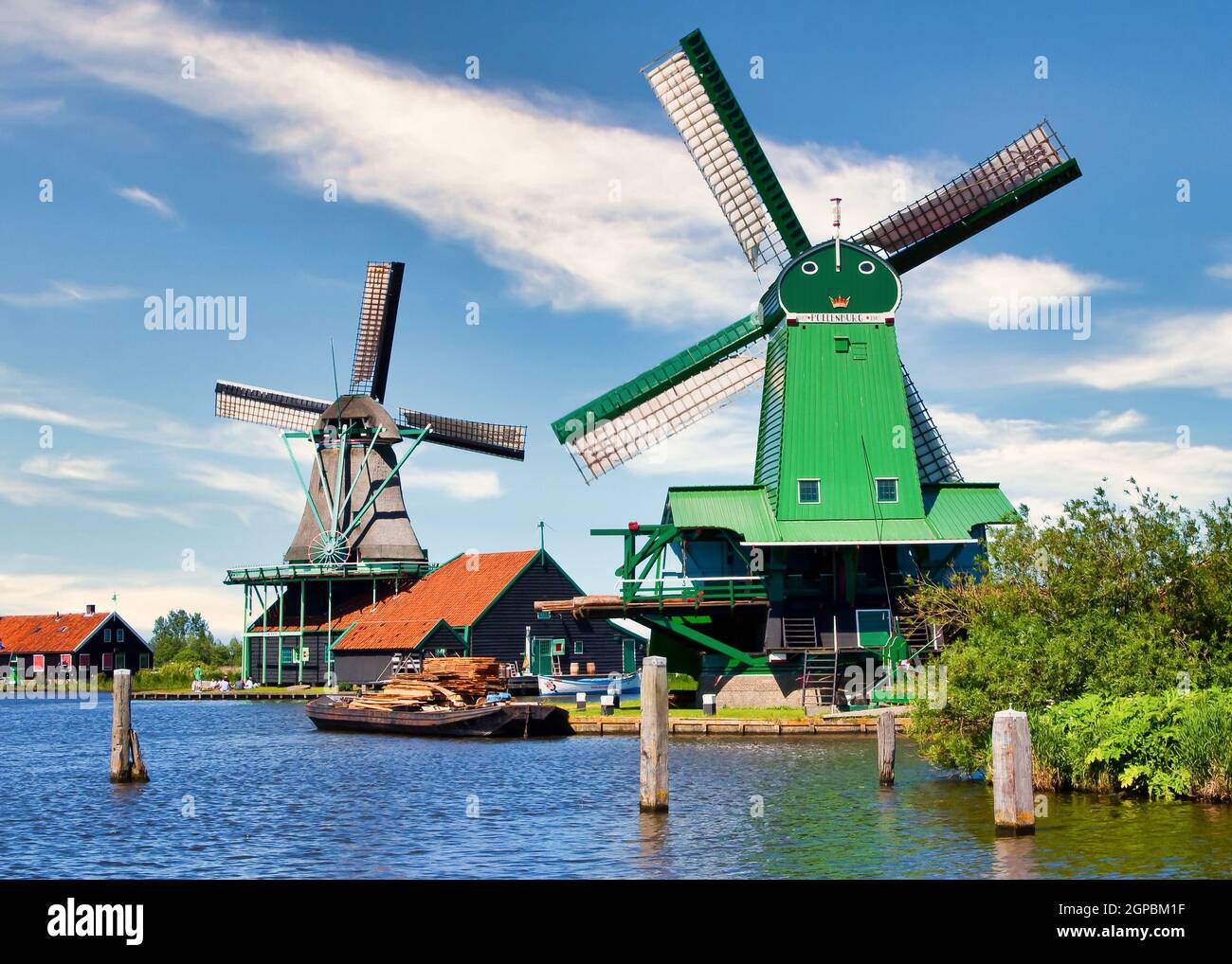 ZAANSE SCHANS, NETHERLANDS - CIRCA AUGUST 2020: Dutch windmill in green ...