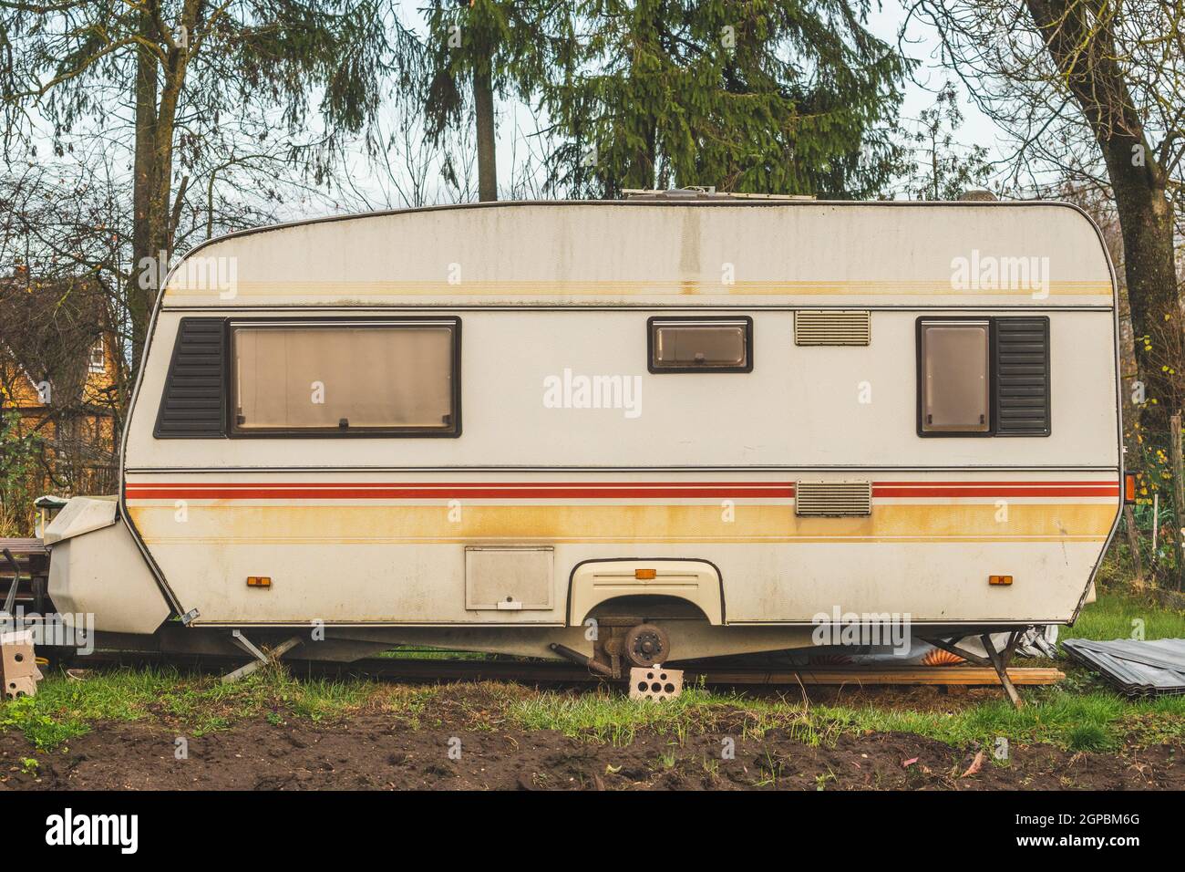 Abandoned vintage caravan/ camper Van parked at the garden Stock Photo ...