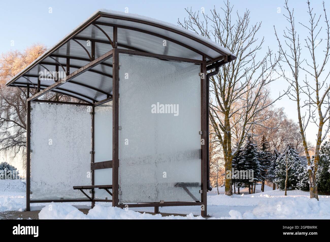 Small empty bus stop with frozen glass in a winter morning Stock Photo ...