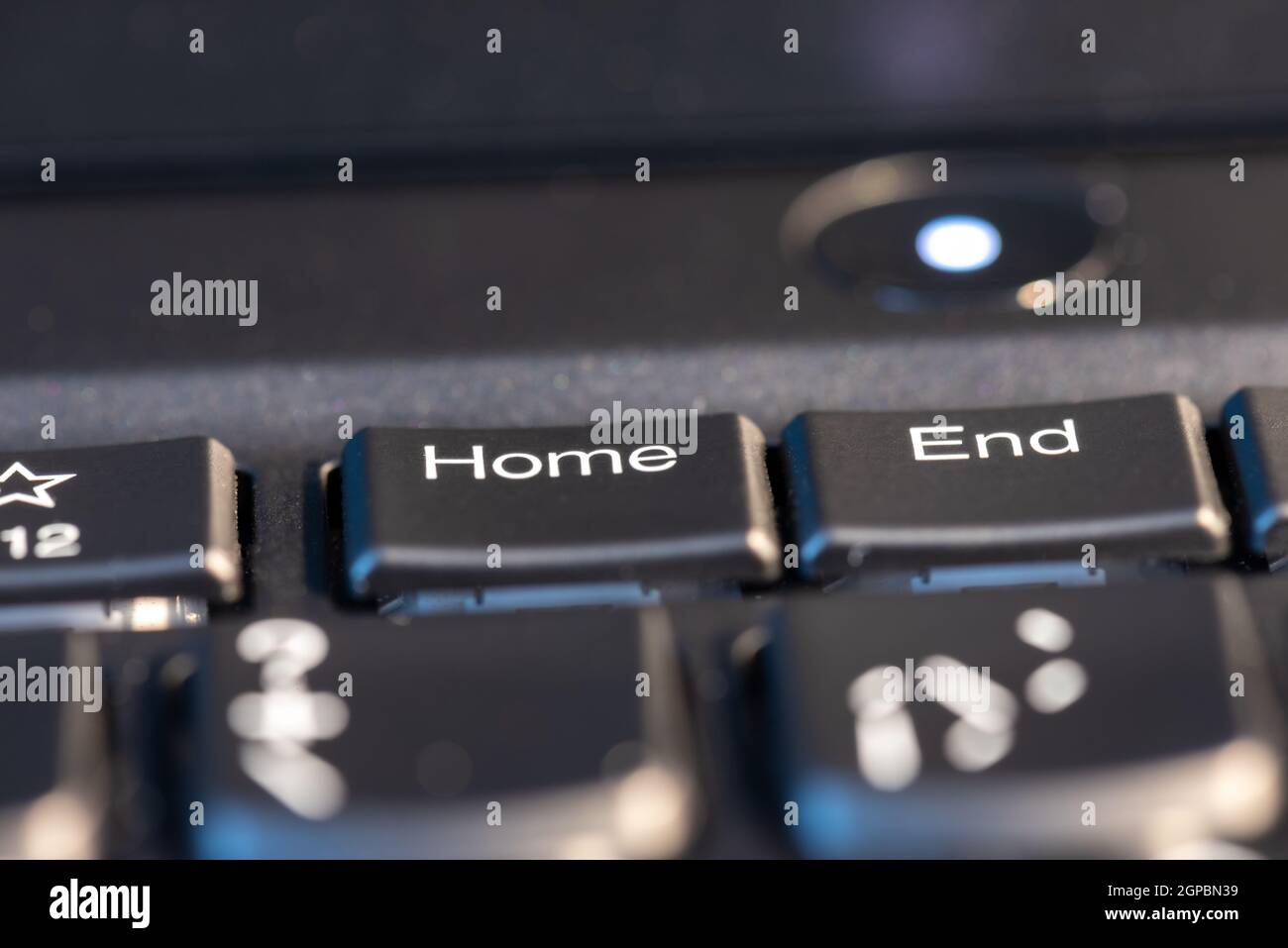 Macro shot of black keyboard focus on home and end key Stock Photo - Alamy