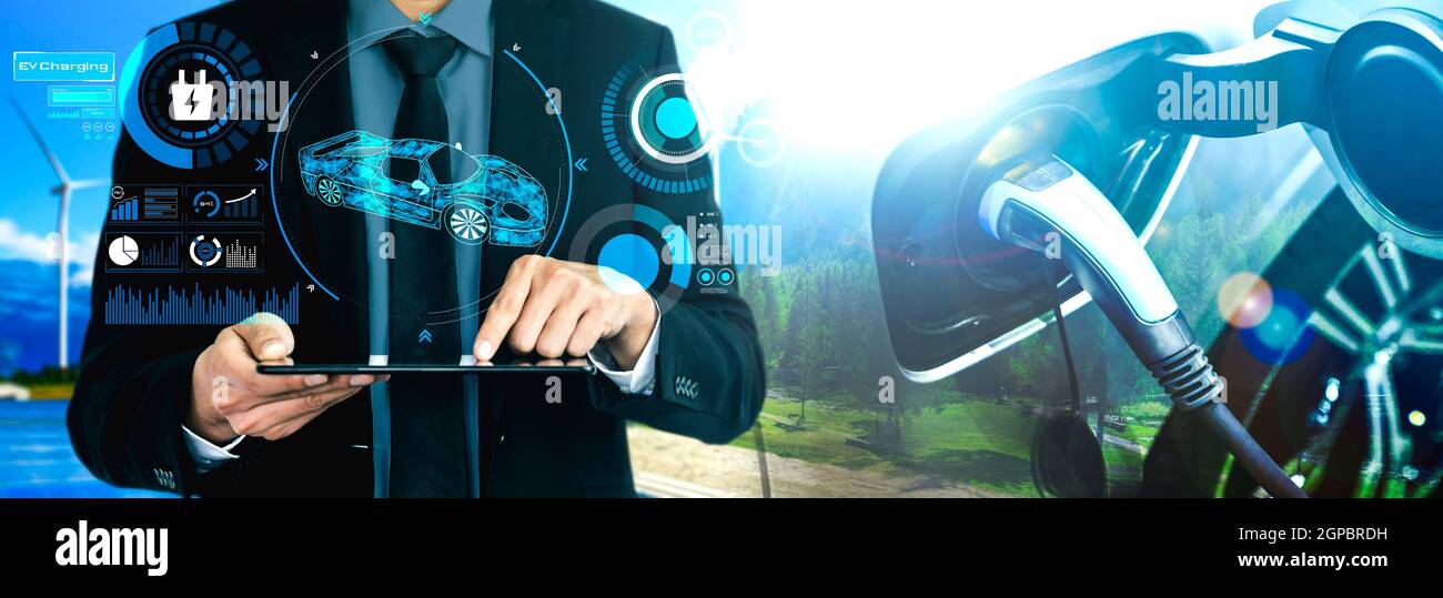 Electric car virtual reality concept with EV charging station for green ...