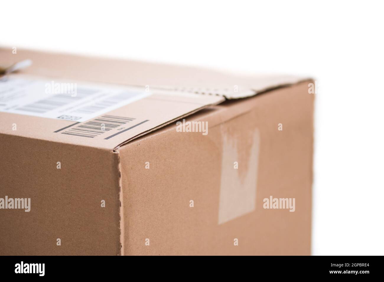 Cardboard box shipping concept: Isolated brown parcel Stock Photo - Alamy