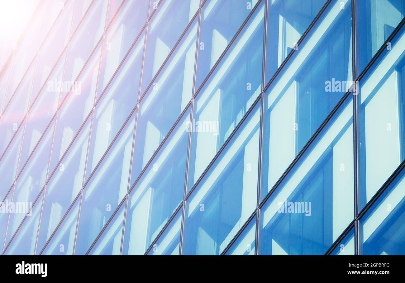 Modern office building: Skyscraper with blue glass Stock Photo - Alamy
