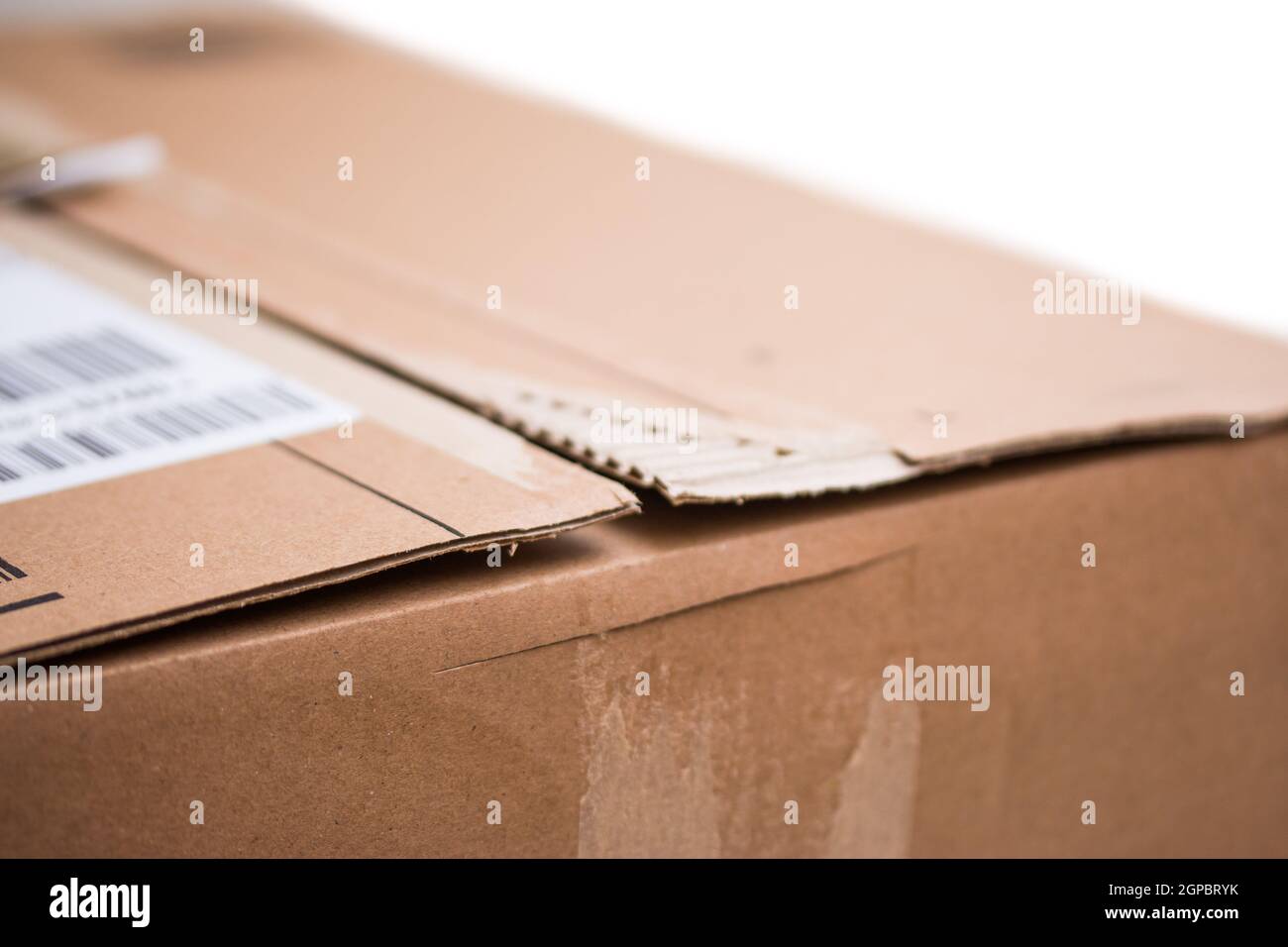 Cardboard box shipping concept: Isolated brown parcel Stock Photo - Alamy