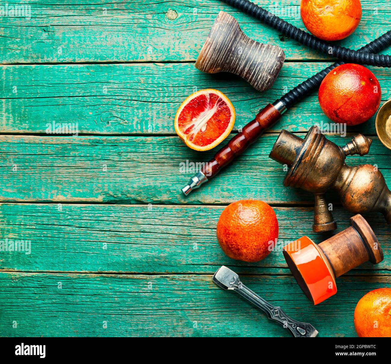 Eastern smoking hookah or shisha with tobacco with grapefruit flavor ...