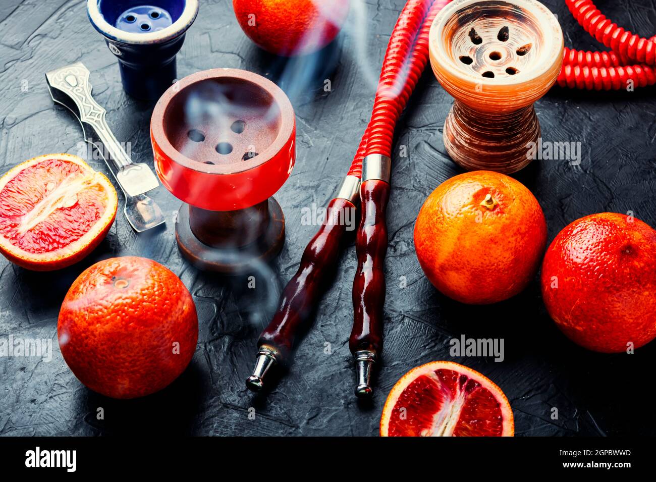 Oriental smoking hookah or shisha with tobacco with grapefruit flavor ...