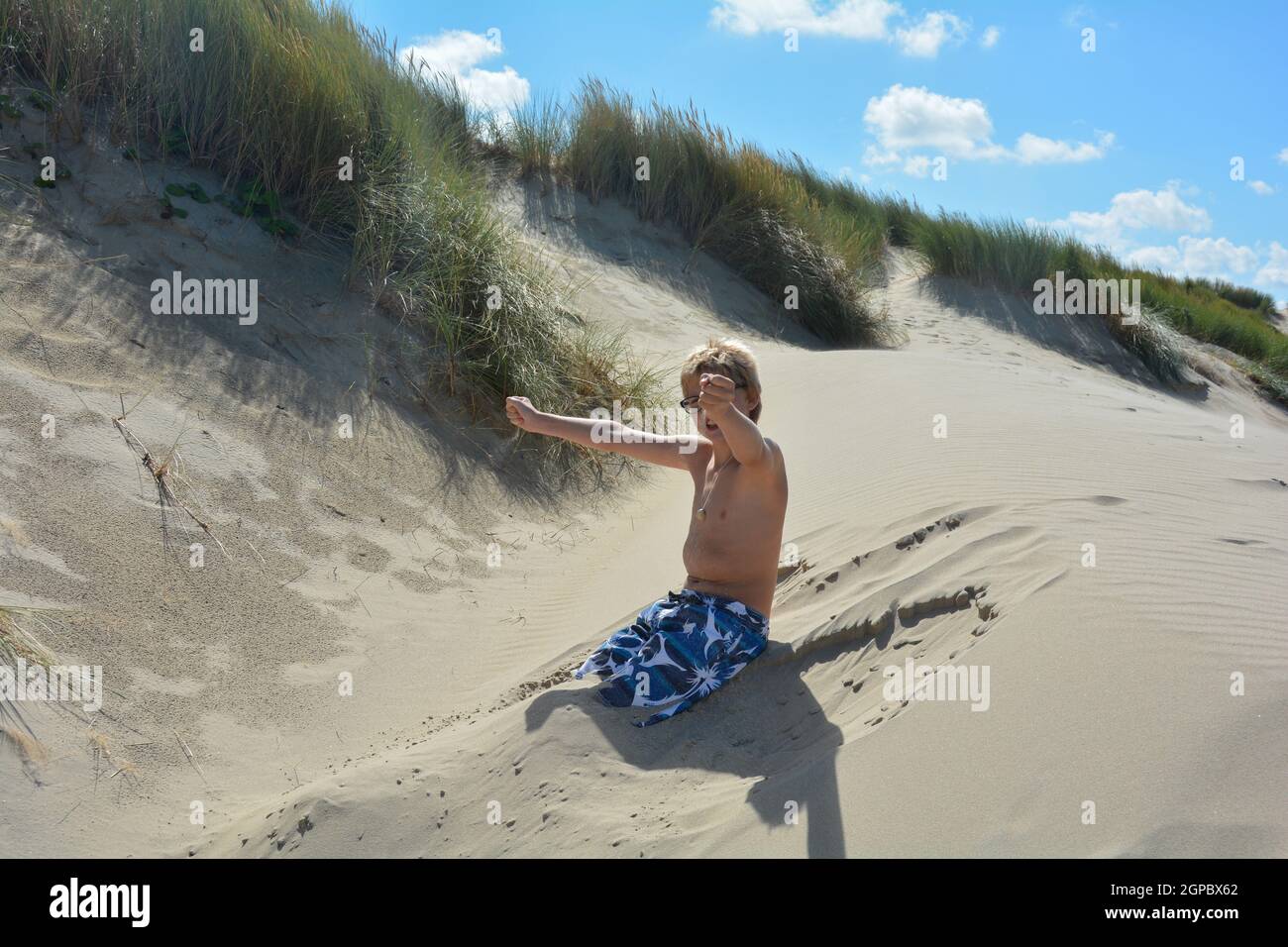 Hands play in sand hi-res stock photography and images - Alamy