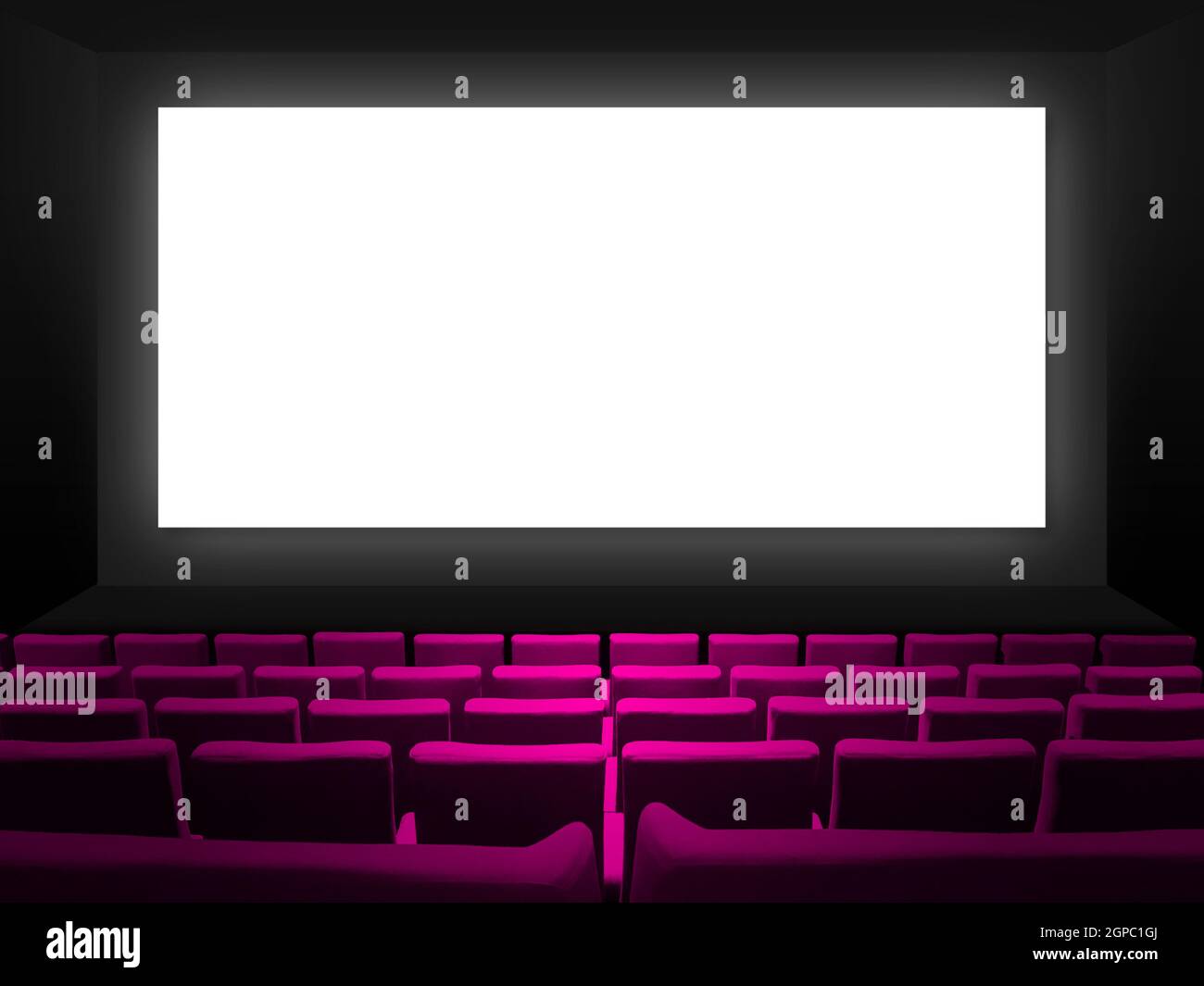 Cinema movie theatre with pink velvet seats and a blank white screen ...