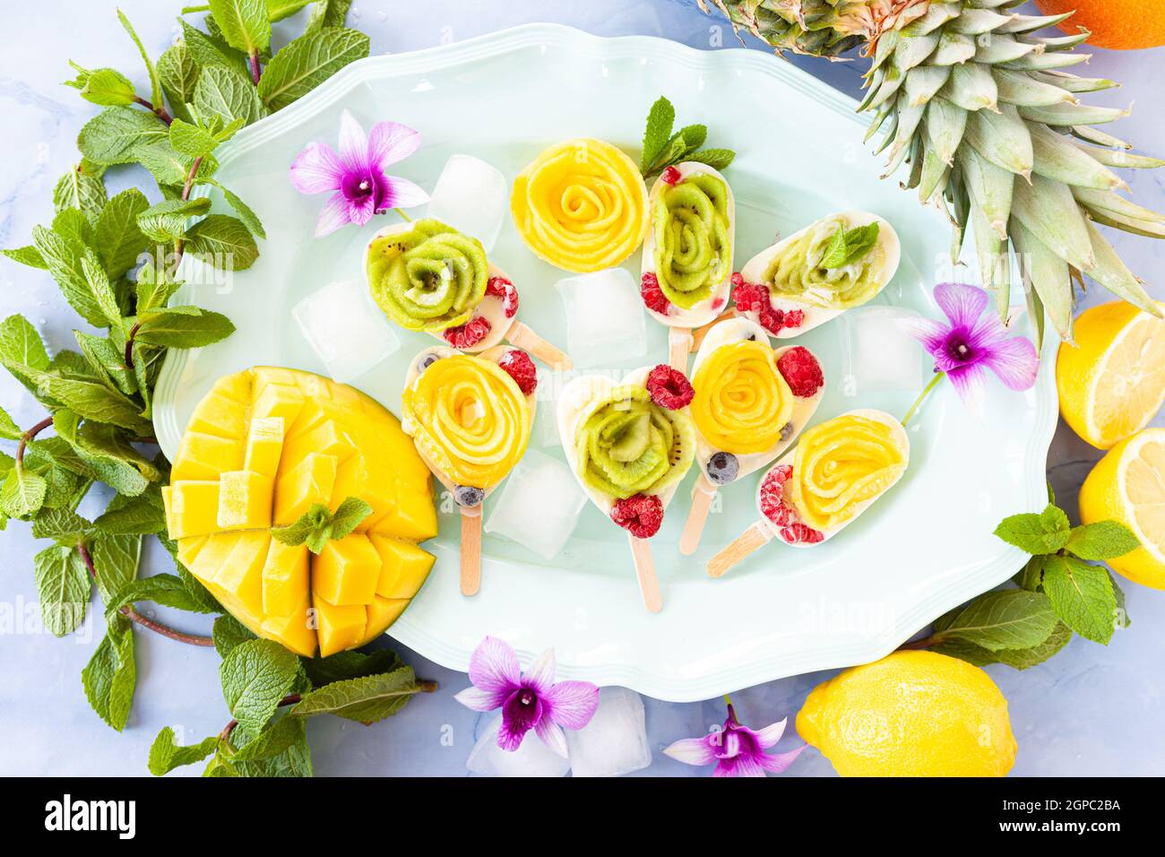 Homemade frozen popsicles with exotic fruits and coconut milk Stock ...