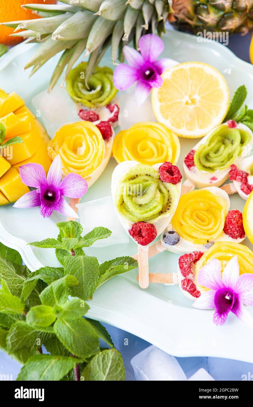 Homemade frozen popsicles with exotic fruits and coconut milk Stock ...