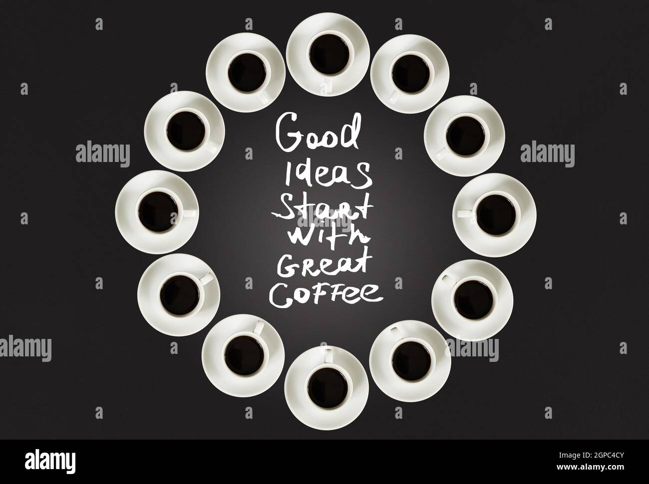 Cups with coffee, stacked in a circle. Clock consist of twenty cups ...