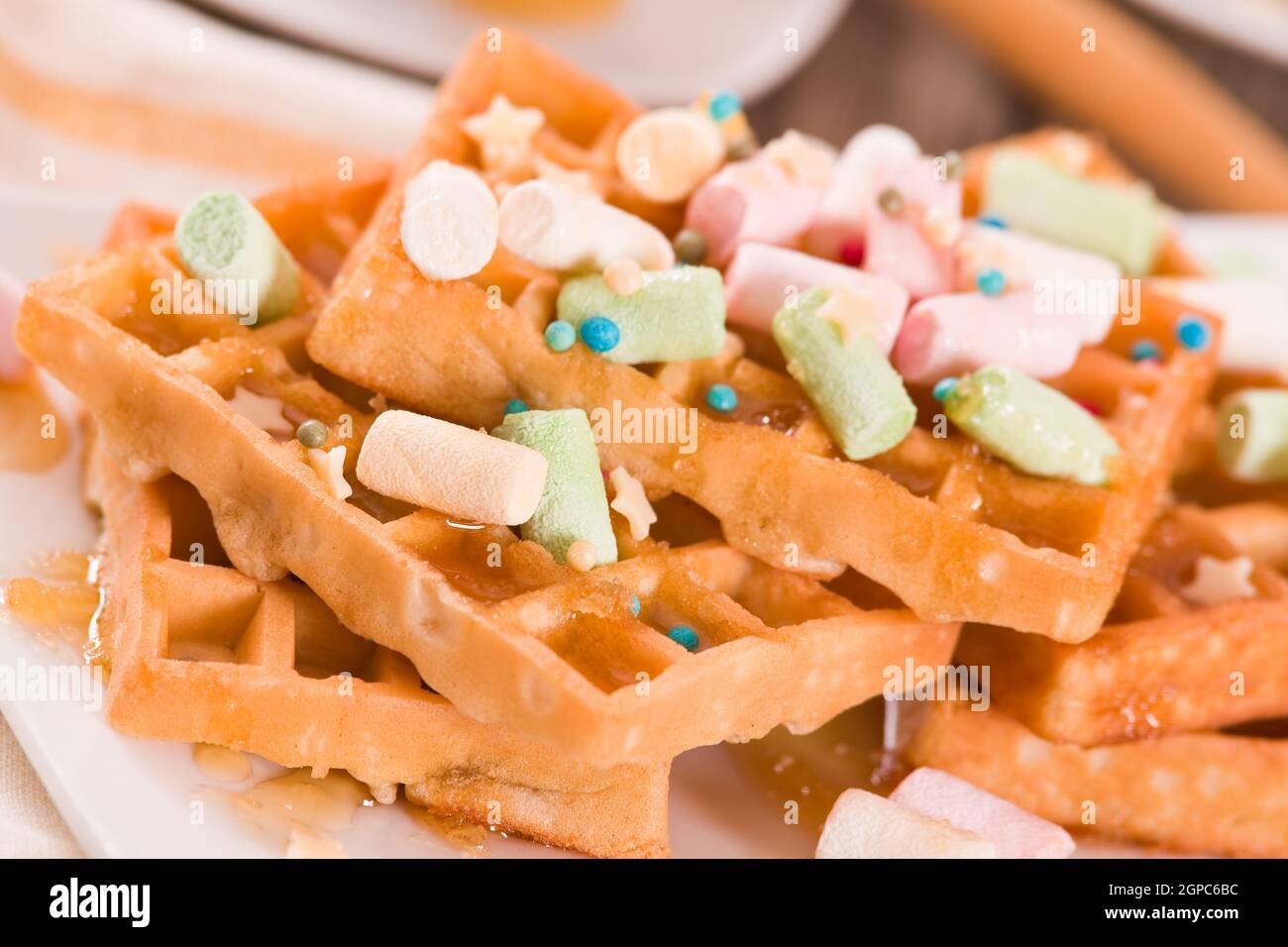 Waffles with colourful marshmallow Stock Photo - Alamy