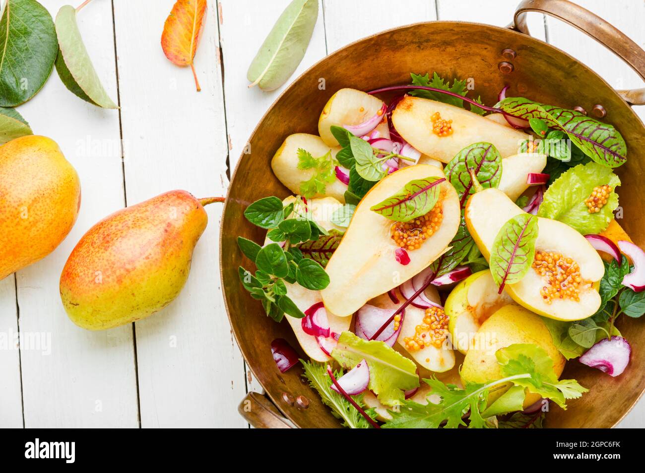 Fresh autumn salad.Appetizing salad with pear and herbs Stock Photo - Alamy