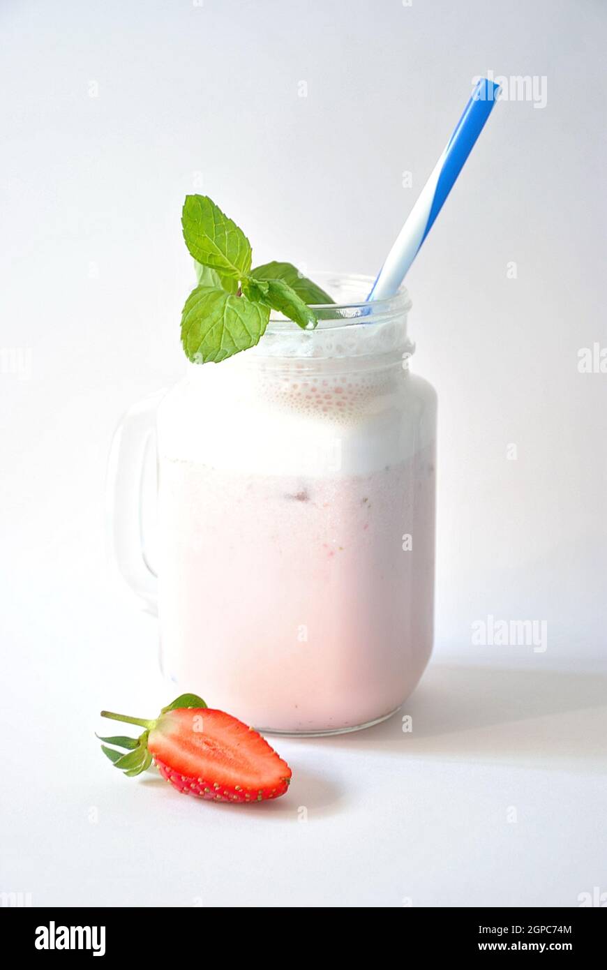 Strawberry milkshake in glass, healthy high protein, yummy taste. Drink ...