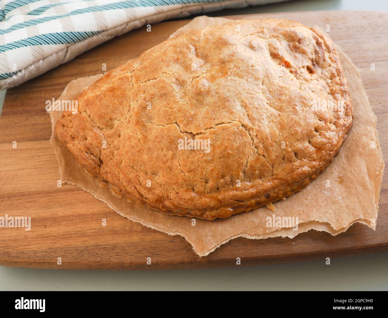 Vegetable pate from the oven on a rustic wooden table, view from above ...