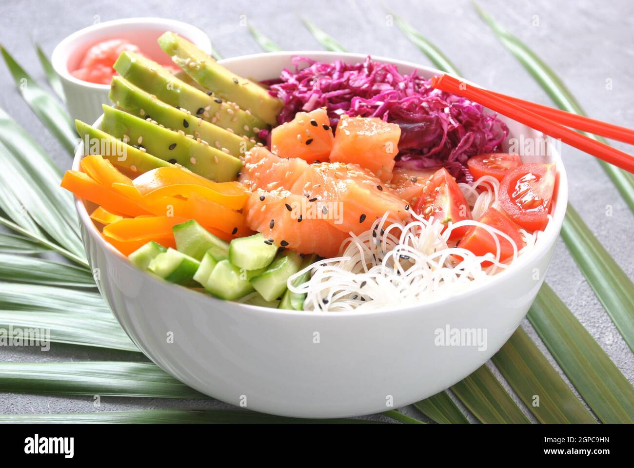 Fresh seafood recipe. Organic food. Fresh salmon poke bowl with crystal ...
