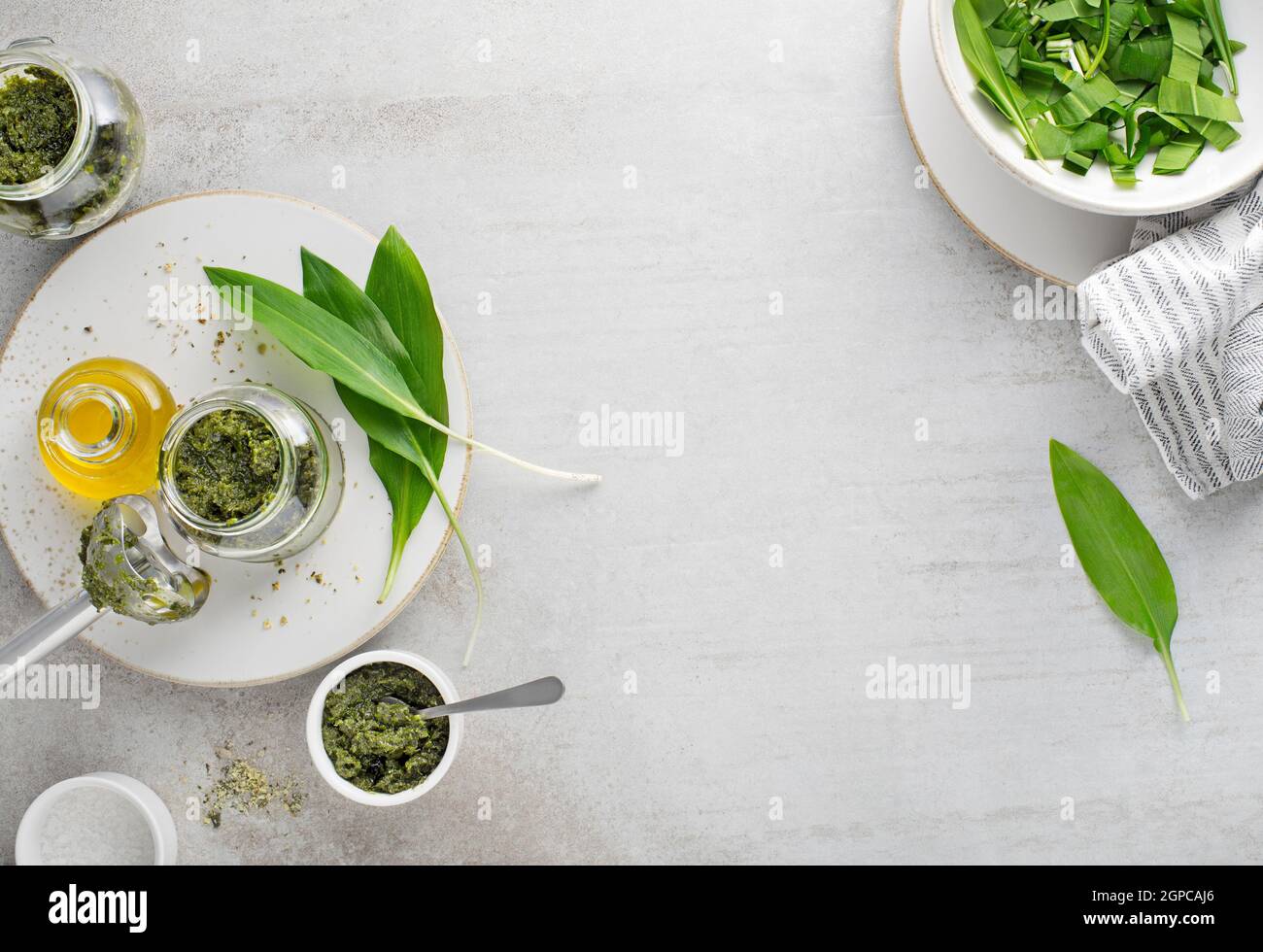 Making Fresh ramson or wild garlic pesto. Healthy spring food concept ...