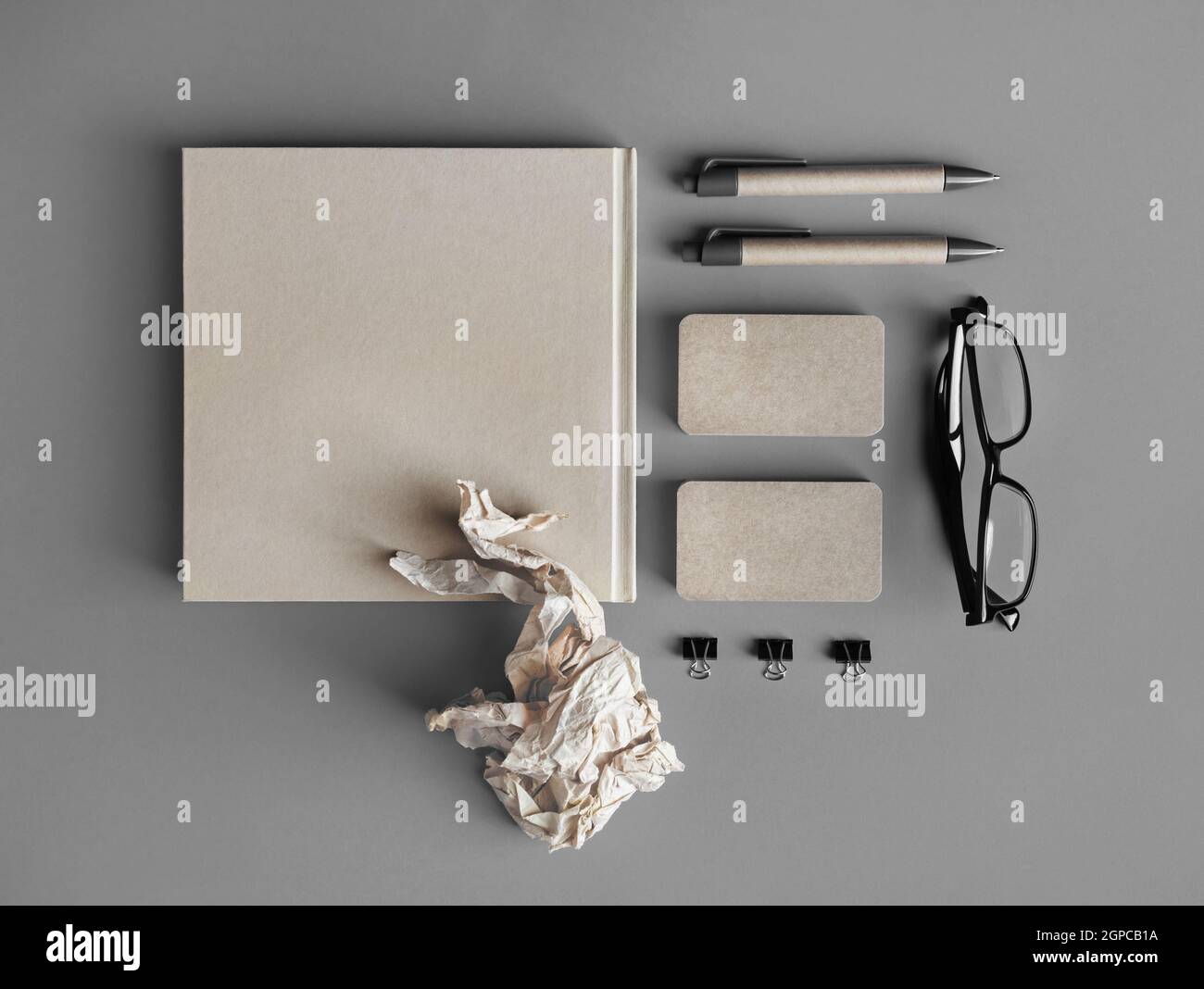 Photo of blank kraft stationery on gray paper background. Top view ...