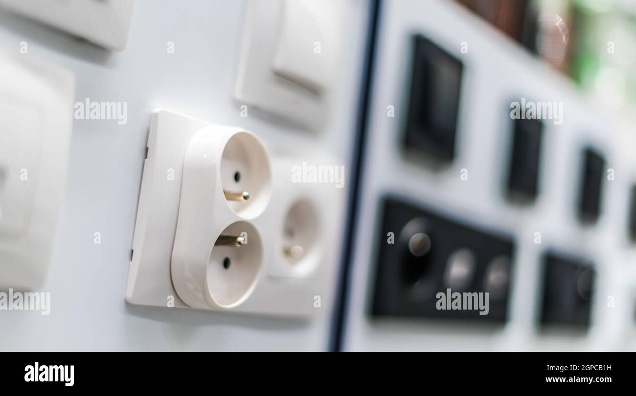 Electric sockets and switches presented in an electrical goods store ...