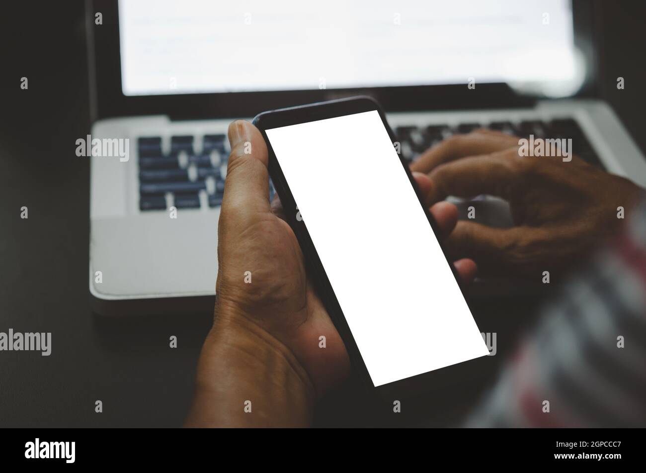 hand holding phone mockup image blank screen computer laptop for ...