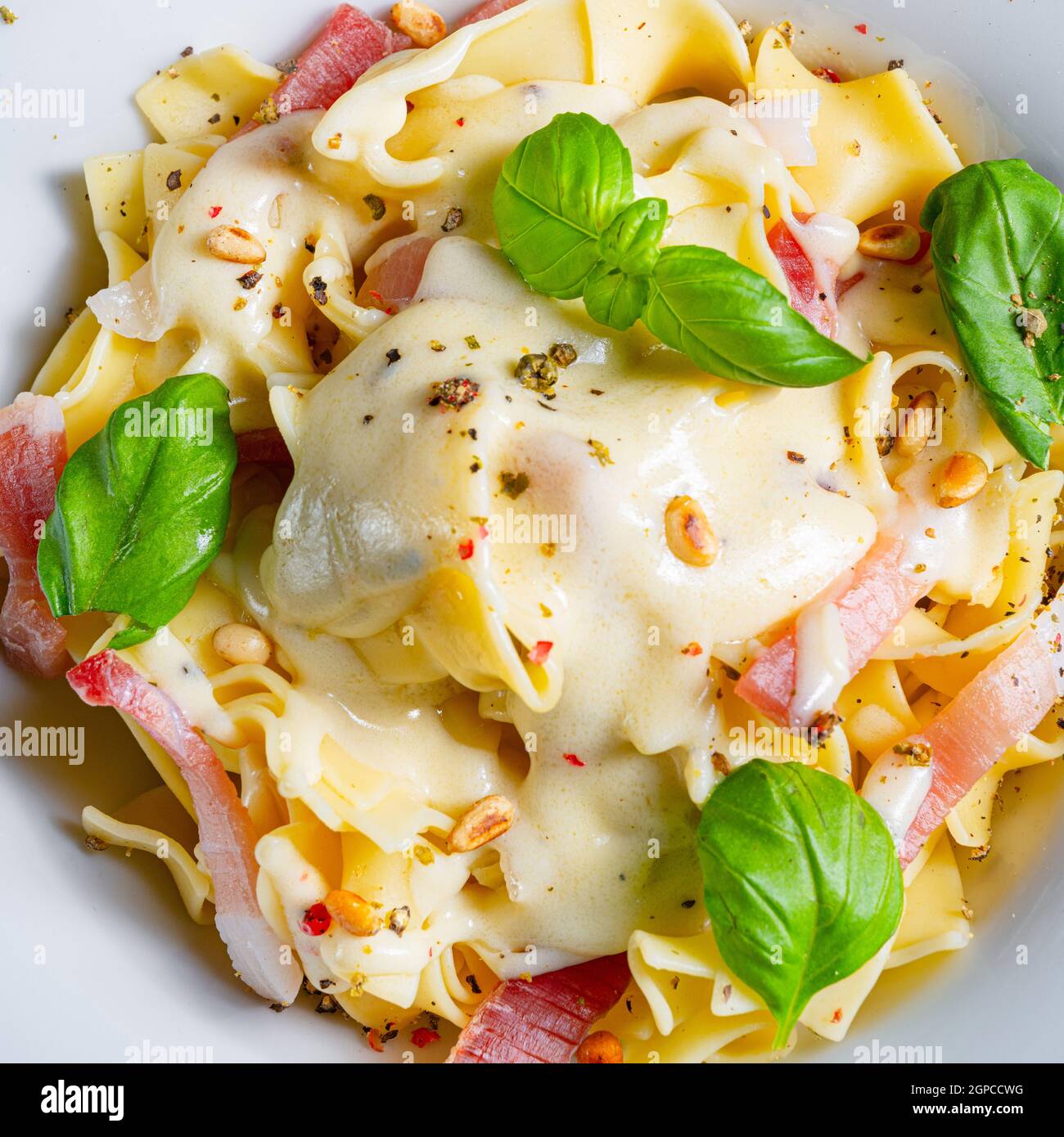Tagliatelle with gorgonzola masarpone sauce and ham Stock Photo - Alamy
