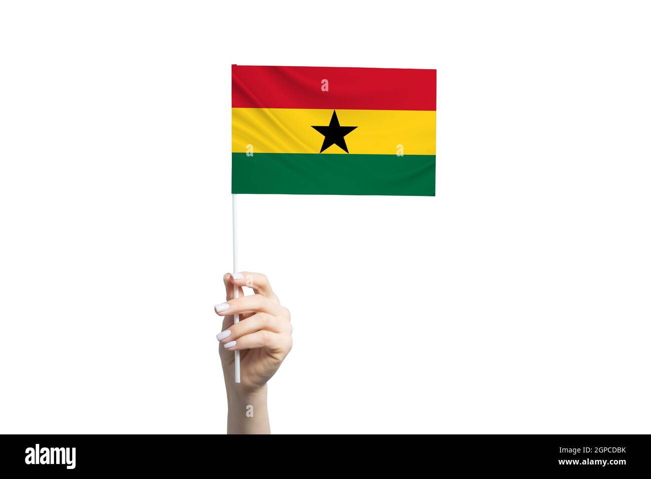 Beautiful female hand holding Ghana flag, isolated on white background ...