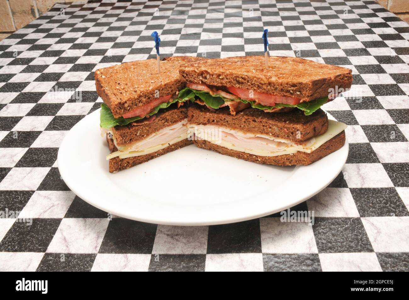 Delicious Amrican cuisine known as the turkey bacon club sandwich Stock ...